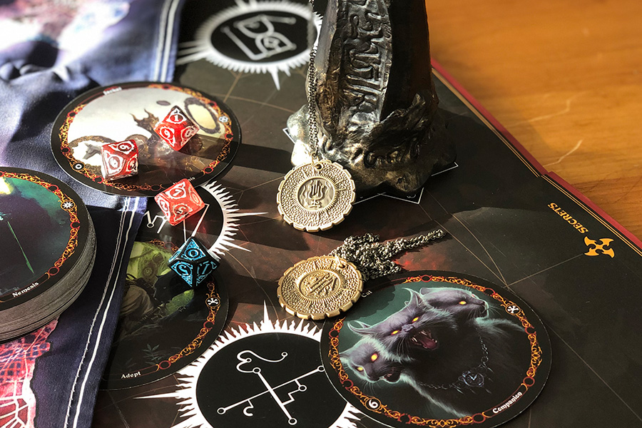 Invisible Sun Medallions - Monte Cook Games