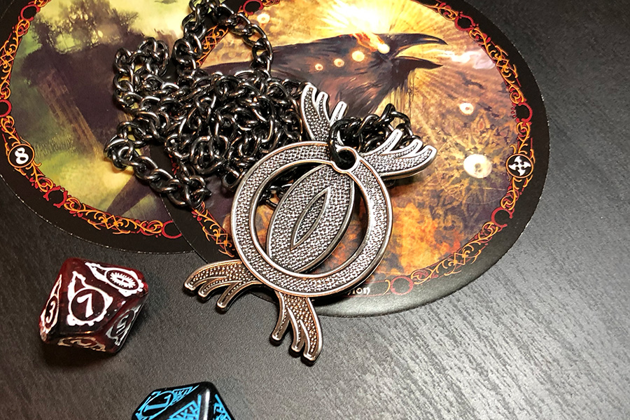 Invisible Sun Medallions - Monte Cook Games